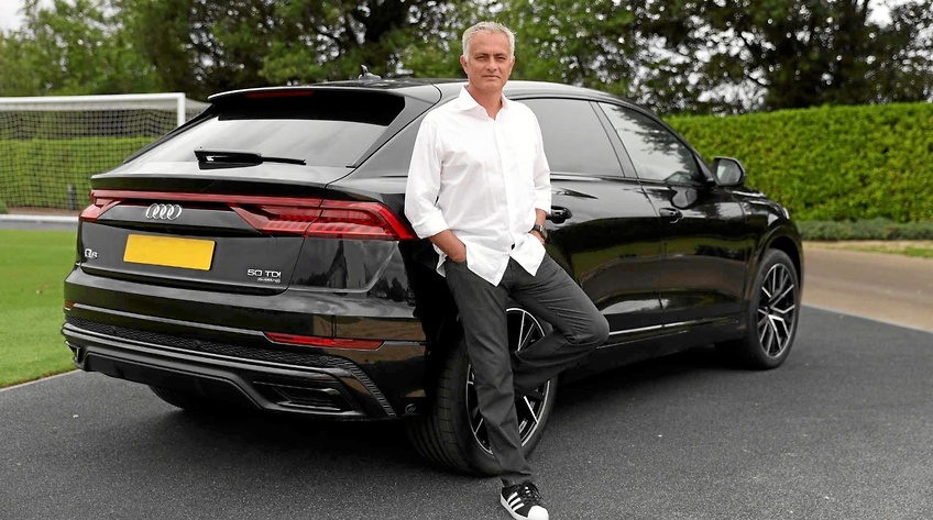 Fodboldtrænere og deres store biler